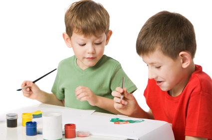 two boys draw